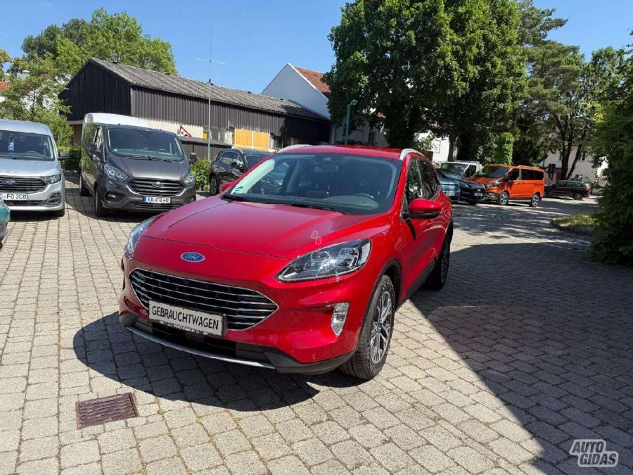 Red Ford Kuga 2021 in Kaunas, with an engine capacity of 1.50 L and mileage of 29 thousand km for 25376 €, photo 1 on AUTOMOTO.COM.LV