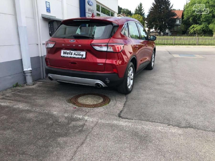 Red Ford Kuga 2021 in Kaunas, with an engine capacity of 2.50 L and mileage of 46 thousand km for 25377 €, photo 4 on AUTOMOTO.COM.LV