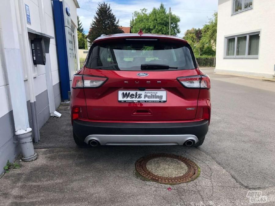 Red Ford Kuga 2021 in Kaunas, with an engine capacity of 2.50 L and mileage of 46 thousand km for 25377 €, photo 5 on AUTOMOTO.COM.LV