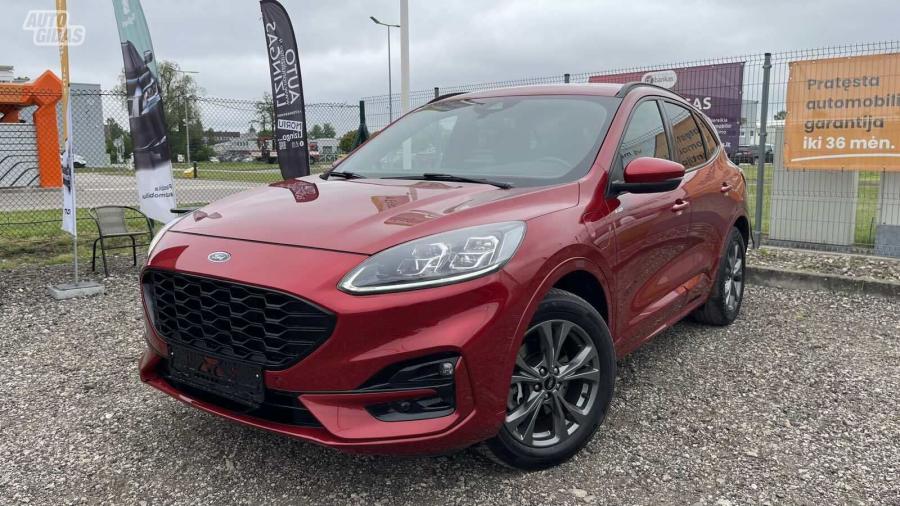 Red Ford Kuga 2021 in Marijampole, with an engine capacity of 2.50 L and mileage of 216 thousand km for 15990 €, photo 1 on AUTOMOTO.COM.LV