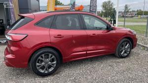 Red Ford Kuga 2021 in Marijampole, with an engine capacity of 2.50 L and mileage of 216 thousand km for 15990 €, photo 11 on AUTOMOTO.COM.LV