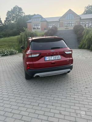 Red Ford Kuga 2023 in Vilnius, with an engine capacity of 2.49 L and mileage of 84 thousand km for 19300 €, photo 7 on AUTOMOTO.COM.LV