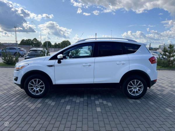 White Ford Kuga 2008 in Siauliai, with an engine capacity of 2.00 L and mileage of 277 thousand km for 4950 €, photo 4 on AUTOMOTO.COM.LV