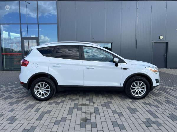 White Ford Kuga 2008 in Siauliai, with an engine capacity of 2.00 L and mileage of 277 thousand km for 4950 €, photo 5 on AUTOMOTO.COM.LV