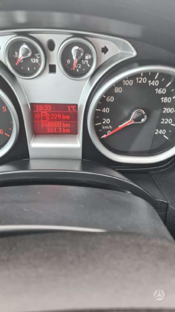 White Ford Kuga 2009 in Siauliai, with an engine capacity of 2.00 L and mileage of 248 thousand km for 4999 €, photo 11 on AUTOMOTO.COM.LV