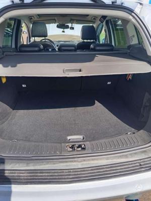 White Ford Kuga 2009 in Kazlu Ruda, with an engine capacity of 2.00 L and mileage of 277 thousand km for 5250 €, photo 23 on AUTOMOTO.COM.LV