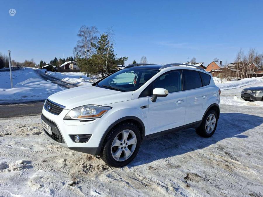 White Ford Kuga 2010 in Plunge, with an engine capacity of 2.00 L and mileage of 190 thousand km for 4950 €, photo 2 on AUTOMOTO.COM.LV