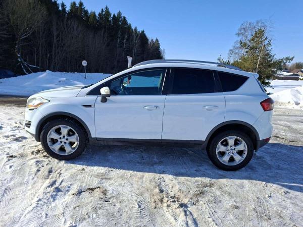White Ford Kuga 2010 in Plunge, with an engine capacity of 2.00 L and mileage of 190 thousand km for 4950 €, photo 6 on AUTOMOTO.COM.LV