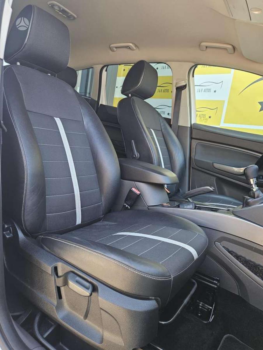 White Ford Kuga 2010 in Siauliai, with an engine capacity of 2.00 L and mileage of 254 thousand km for 5950 €, photo 14 on AUTOMOTO.COM.LV