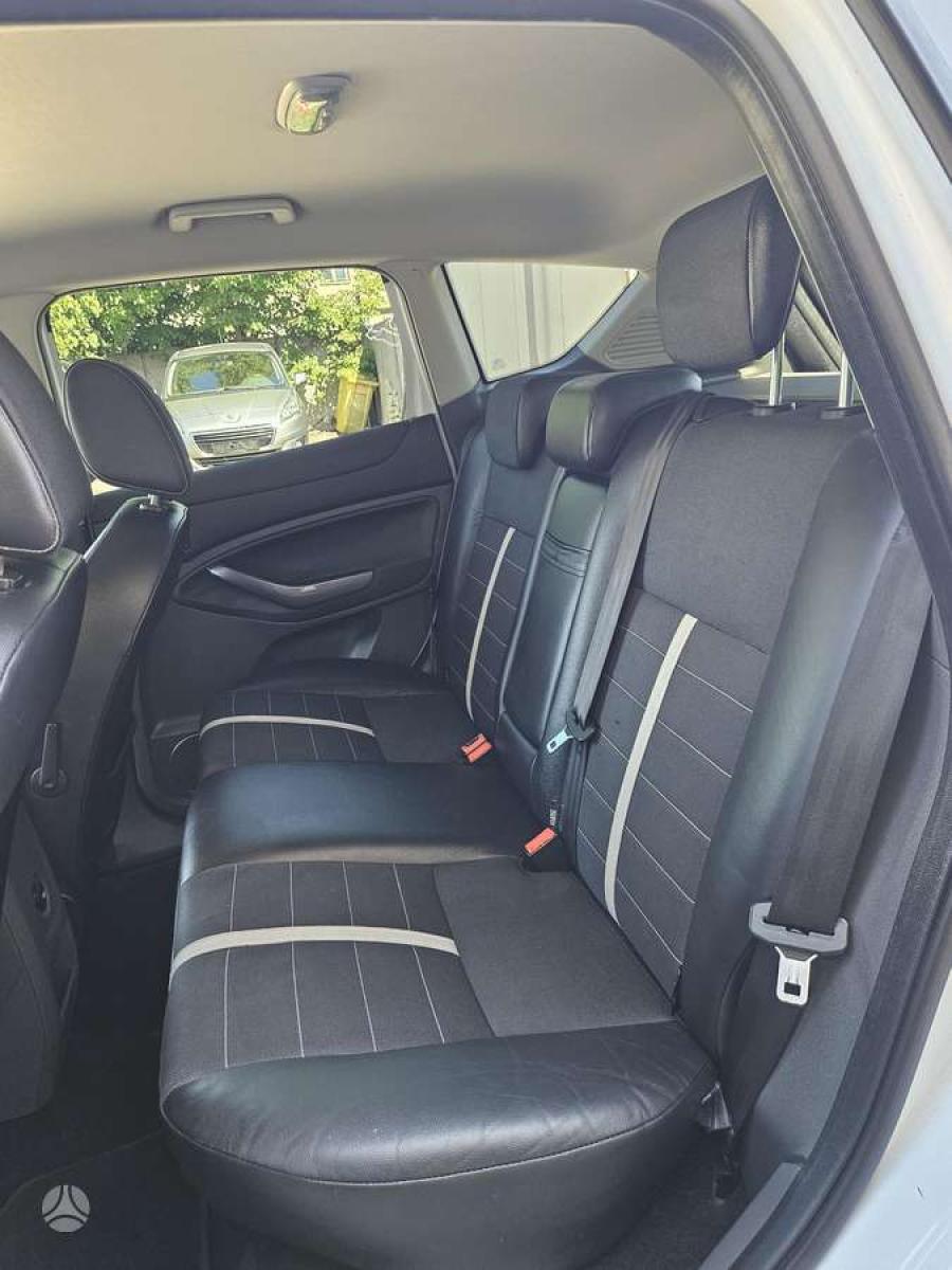 White Ford Kuga 2010 in Siauliai, with an engine capacity of 2.00 L and mileage of 254 thousand km for 5950 €, photo 15 on AUTOMOTO.COM.LV