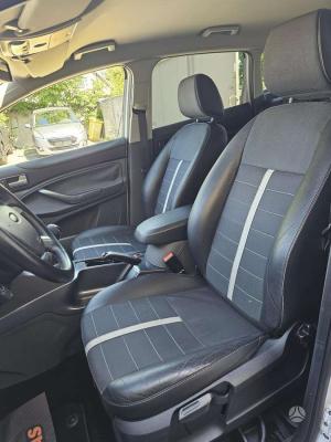 White Ford Kuga 2010 in Siauliai, with an engine capacity of 2.00 L and mileage of 254 thousand km for 5950 €, photo 16 on AUTOMOTO.COM.LV