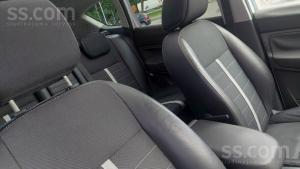 White Ford Kuga 2011 in Riga, with an engine capacity of 2.00 L and mileage of 262 thousand km for 6400 €, photo 13 on AUTOMOTO.COM.LV