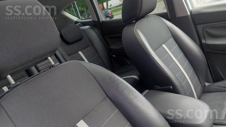 White Ford Kuga 2011 in Riga, with an engine capacity of 2.00 L and mileage of 262 thousand km for 6400 €, photo 13 on AUTOMOTO.COM.LV