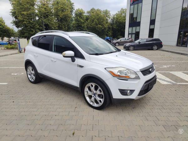 White Ford Kuga 2011 in Kaunas, with an engine capacity of 2.00 L and mileage of 118 thousand km for 5900 €, photo 1 on AUTOMOTO.COM.LV