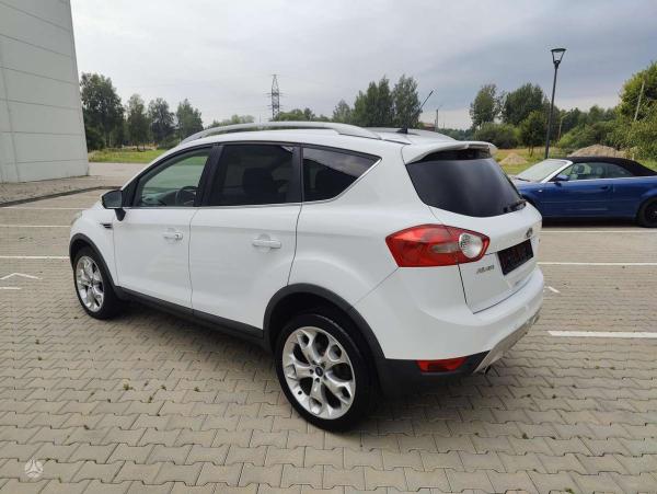 White Ford Kuga 2011 in Kaunas, with an engine capacity of 2.00 L and mileage of 118 thousand km for 5900 €, photo 6 on AUTOMOTO.COM.LV