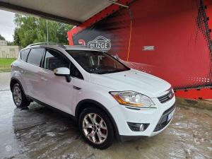White Ford Kuga 2011 in Mazeikiai, with an engine capacity of 2.00 L and mileage of 294 thousand km for 5100 €, photo  on AUTOMOTO.COM.LV