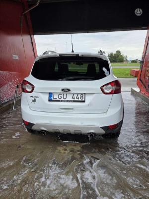 White Ford Kuga 2011 in Mazeikiai, with an engine capacity of 2.00 L and mileage of 294 thousand km for 5100 €, photo 4 on AUTOMOTO.COM.LV
