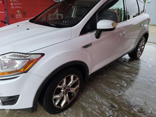 White Ford Kuga 2011 in Mazeikiai, with an engine capacity of 2.00 L and mileage of 294 thousand km for 5100 €, photo 7 on AUTOMOTO.COM.LV