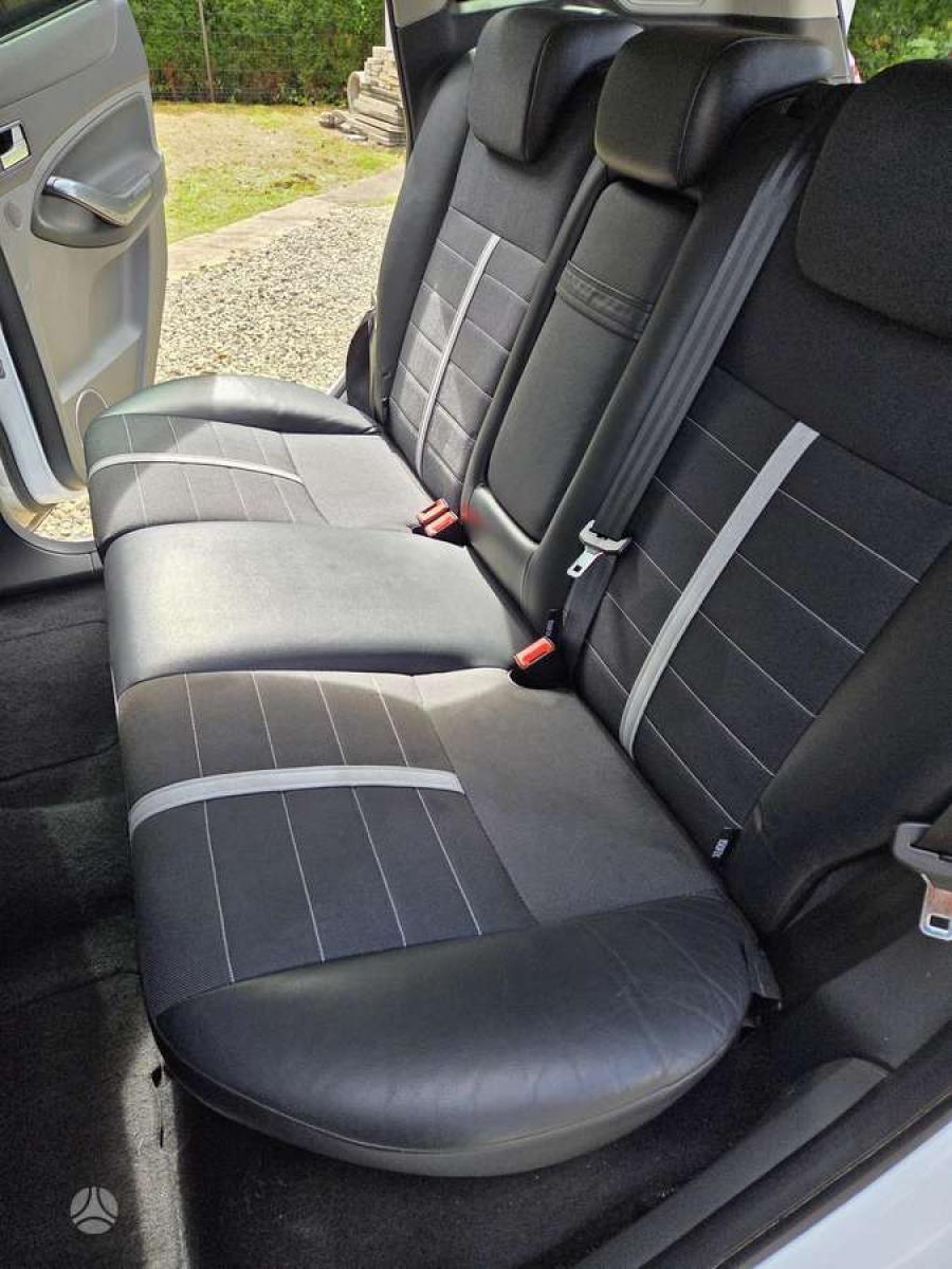 White Ford Kuga 2011 in Mazeikiai, with an engine capacity of 2.00 L and mileage of 294 thousand km for 5100 €, photo 14 on AUTOMOTO.COM.LV