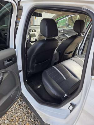 White Ford Kuga 2011 in Mazeikiai, with an engine capacity of 2.00 L and mileage of 294 thousand km for 5100 €, photo 15 on AUTOMOTO.COM.LV