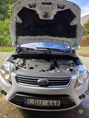 White Ford Kuga 2011 in Mazeikiai, with an engine capacity of 2.00 L and mileage of 294 thousand km for 5100 €, photo 21 on AUTOMOTO.COM.LV