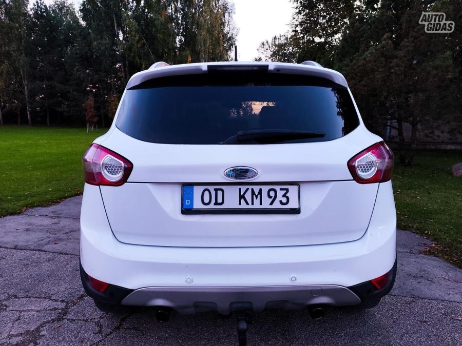 White Ford Kuga 2011 in Mazeikiai, with an engine capacity of 2.00 L and mileage of 246 thousand km for 5600 €, photo 7 on AUTOMOTO.COM.LV