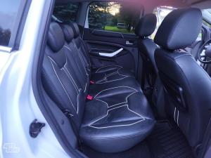 White Ford Kuga 2011 in Mazeikiai, with an engine capacity of 2.00 L and mileage of 246 thousand km for 5600 €, photo 14 on AUTOMOTO.COM.LV