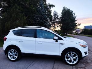 White Ford Kuga 2011 in Mazeikiai, with an engine capacity of 2.00 L and mileage of 246 thousand km for 5600 €, photo 17 on AUTOMOTO.COM.LV