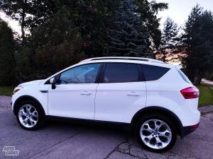 White Ford Kuga 2011 in Mazeikiai, with an engine capacity of 2.00 L and mileage of 246 thousand km for 5600 €, photo 20 on AUTOMOTO.COM.LV