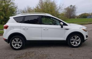 White Ford Kuga 2011 in Siauliai, with an engine capacity of 2.00 L and mileage of 205 thousand km for 4700 €, photo 6 on AUTOMOTO.COM.LV