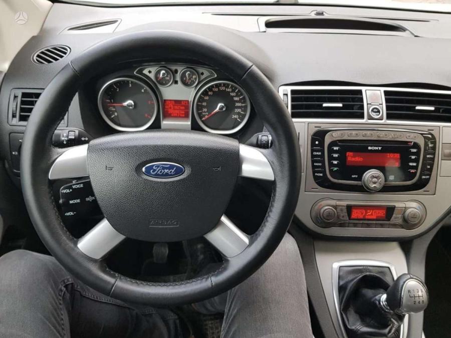 White Ford Kuga 2011 in Siauliai, with an engine capacity of 2.00 L and mileage of 205 thousand km for 4700 €, photo 14 on AUTOMOTO.COM.LV