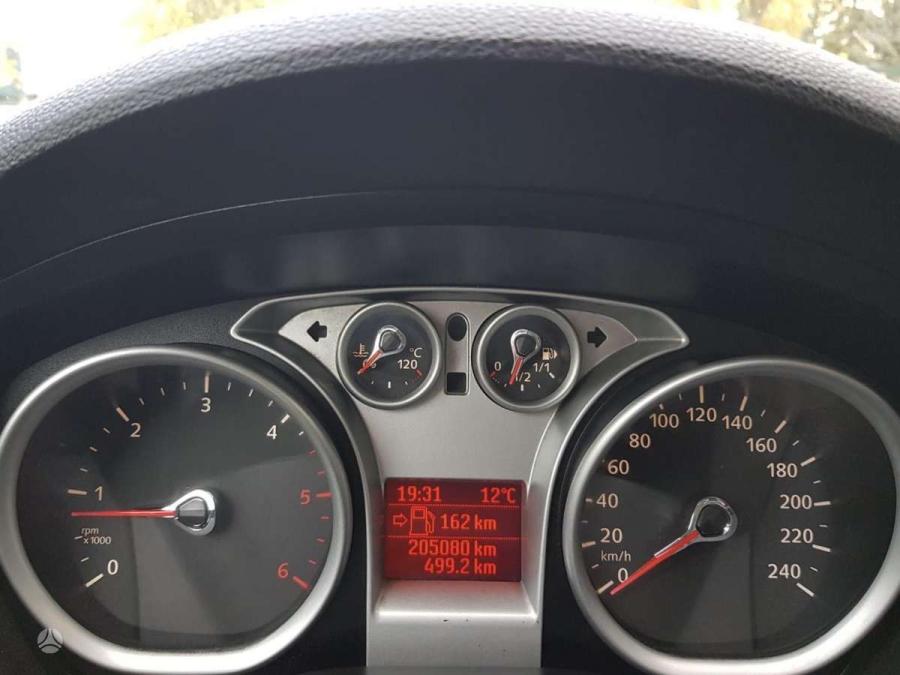 White Ford Kuga 2011 in Siauliai, with an engine capacity of 2.00 L and mileage of 205 thousand km for 4700 €, photo 15 on AUTOMOTO.COM.LV