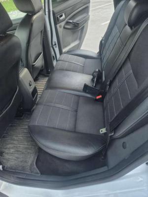 White Ford Kuga 2012 in Joniskis, with an engine capacity of 2.00 L and mileage of 229 thousand km for 7200 €, photo 5 on AUTOMOTO.COM.LV
