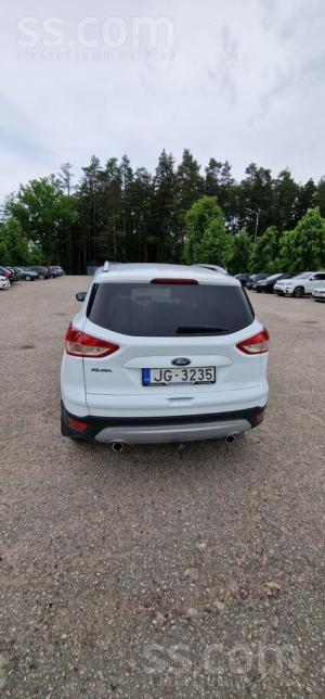 White Ford Kuga 2013 in Cesis, with an engine capacity of 2.00 L and mileage of 255 thousand km for 6500 €, photo 13 on AUTOMOTO.COM.LV