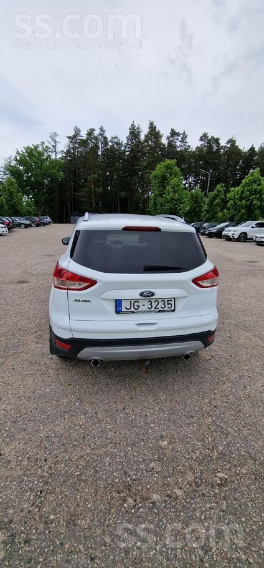 White Ford Kuga 2013 in Cesis, with an engine capacity of 2.00 L and mileage of 255 thousand km for 6500 €, photo 13 on AUTOMOTO.COM.LV