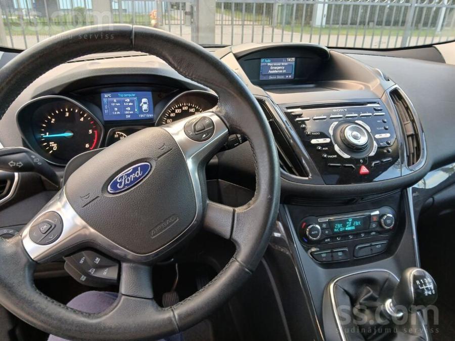White Ford Kuga 2013 in Riga, with an engine capacity of 2.00 L and mileage of 196 thousand km for 5450 €, photo 4 on AUTOMOTO.COM.LV
