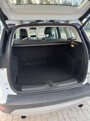 White Ford Kuga 2013 in Riga, with an engine capacity of 2.00 L and mileage of 196 thousand km for 5450 €, photo 8 on AUTOMOTO.COM.LV