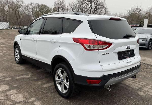 White Ford Kuga 2014 in Panevezys, with an engine capacity of 2.00 L and mileage of 156 thousand km for 6100 €, photo 4 on AUTOMOTO.COM.LV