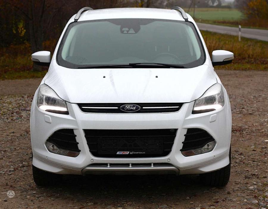 White Ford Kuga 2014 in Kretinga, with an engine capacity of 2.00 L and mileage of 154 thousand km for 8999 €, photo 3 on AUTOMOTO.COM.LV