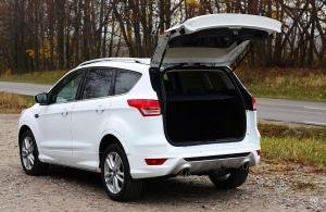 White Ford Kuga 2014 in Kretinga, with an engine capacity of 2.00 L and mileage of 154 thousand km for 8999 €, photo 14 on AUTOMOTO.COM.LV