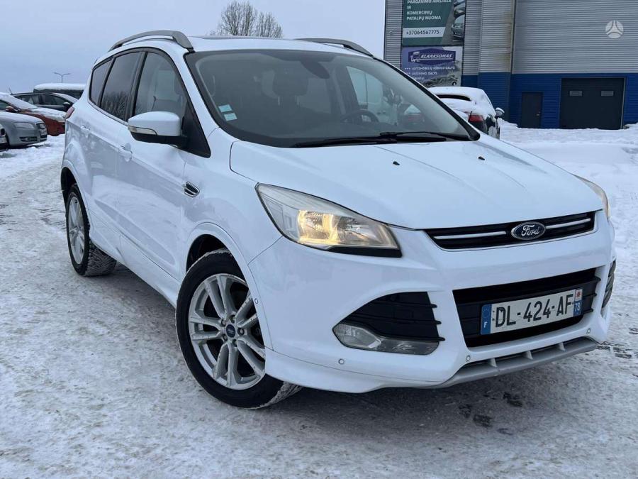 White Ford Kuga 2014 in Taurage, with an engine capacity of 2.00 L and mileage of 280 thousand km for 6999 €, photo 3 on AUTOMOTO.COM.LV