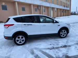 White Ford Kuga 2014 in Siauliai, with an engine capacity of 1.60 L and mileage of 260 thousand km for 5999 €, photo 5 on AUTOMOTO.COM.LV