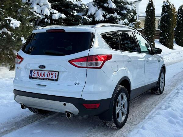 White Ford Kuga 2014 in Utena, with an engine capacity of 2.00 L and mileage of 240 thousand km for 6300 €, photo 5 on AUTOMOTO.COM.LV