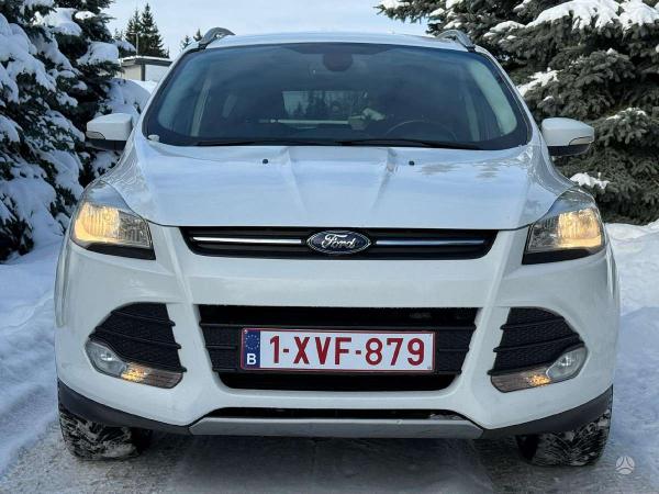 White Ford Kuga 2014 in Utena, with an engine capacity of 2.00 L and mileage of 240 thousand km for 6300 €, photo 7 on AUTOMOTO.COM.LV