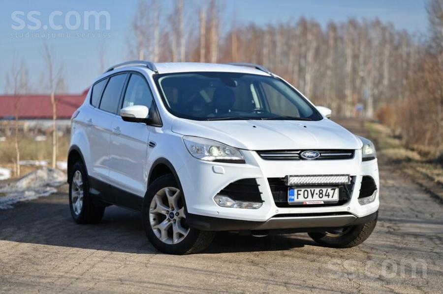 White Ford Kuga 2014 in Dobele, with an engine capacity of 2.00 L and mileage of 200 thousand km for 7450 €, photo 4 on AUTOMOTO.COM.LV