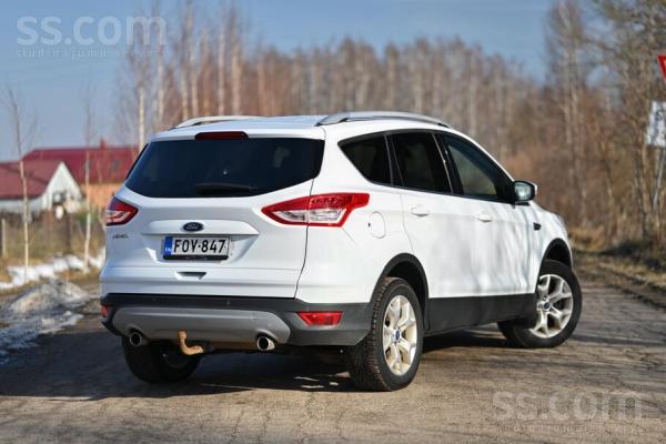 White Ford Kuga 2014 in Dobele, with an engine capacity of 2.00 L and mileage of 200 thousand km for 7450 €, photo 7 on AUTOMOTO.COM.LV