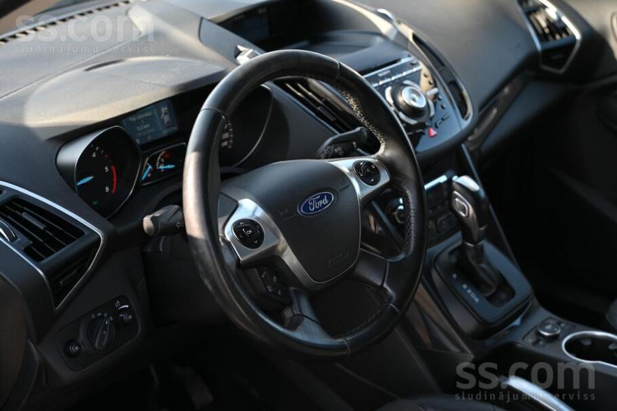 White Ford Kuga 2014 in Dobele, with an engine capacity of 2.00 L and mileage of 200 thousand km for 7450 €, photo 12 on AUTOMOTO.COM.LV