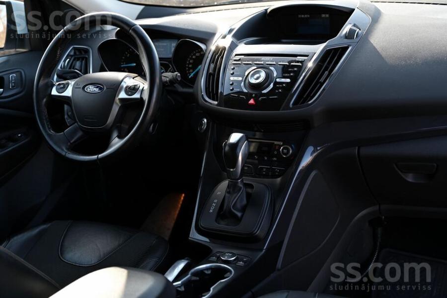 White Ford Kuga 2014 in Dobele, with an engine capacity of 2.00 L and mileage of 200 thousand km for 7450 €, photo 17 on AUTOMOTO.COM.LV