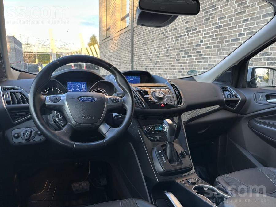 White Ford Kuga 2014 in Tukums, with an engine capacity of 2.00 L and mileage of 151 thousand km for 8990 €, photo 12 on AUTOMOTO.COM.LV