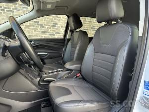 White Ford Kuga 2014 in Tukums, with an engine capacity of 2.00 L and mileage of 151 thousand km for 8990 €, photo 14 on AUTOMOTO.COM.LV